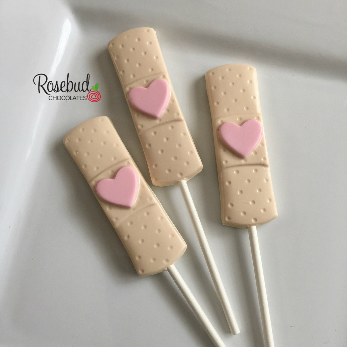 12 BAND-AID Chocolate Lollipop Candy Party Favors Heart – Rosebud ...